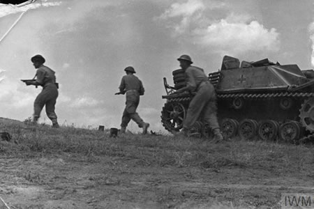 2nd Polish Corps passing by a knocked out German StuG III assault gun ...